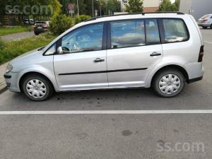 Grey Volkswagen Touran 2008 in Riga, with an engine capacity of 1.90 L and mileage of 383 thousand km for 1000 €, photo 3 on AUTOMOTO.COM.LV