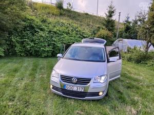 Pelēks Volkswagen Touran 2008 Viļņa, ar dzinēja tilpumu 2.00 L un nobraukumu 438 tūkst. km par 1450 €, foto  vietnē AUTOMOTO.COM.LV