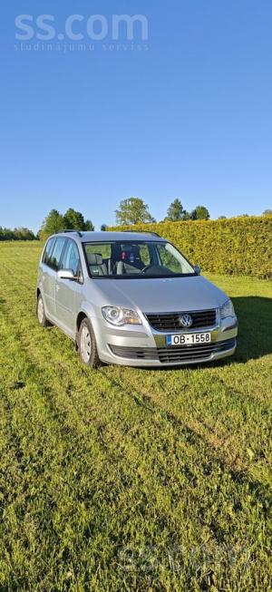 Grey Volkswagen Touran 2008 in Ogre, with an engine capacity of 1.60 L and mileage of 0 thousand km for 3700 €, photo  on AUTOMOTO.COM.LV