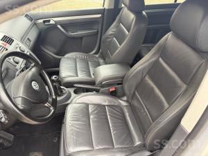 Pelēks Volkswagen Touran 2008 Rēzekne, ar dzinēja tilpumu 1.90 L un nobraukumu 0 tūkst. km par 3850 €, foto 14 vietnē AUTOMOTO.COM.LV