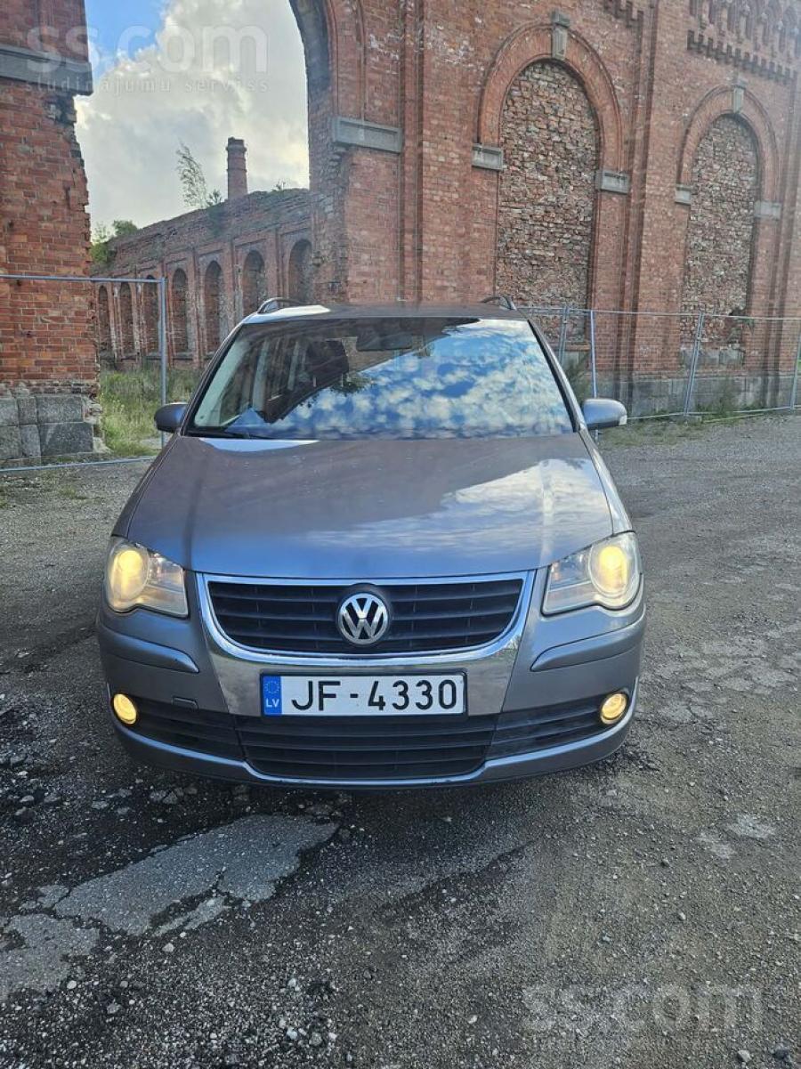 Grey Volkswagen Touran 2008 in Liepaja, with an engine capacity of 2.00 L and mileage of 402 thousand km for 1800 €, photo 7 on AUTOMOTO.COM.LV