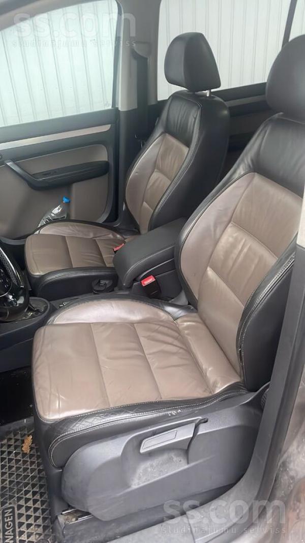 Grey Volkswagen Touran 2009 in Riga, with an engine capacity of 1.90 L and mileage of 248 thousand km for 2500 €, photo 2 on AUTOMOTO.COM.LV