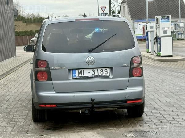 Grey Volkswagen Touran 2009 in Jelgava, with an engine capacity of 1.90 L and mileage of 339 thousand km for 2850 €, photo 6 on AUTOMOTO.COM.LV