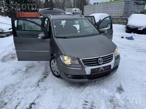 Grey Volkswagen Touran 2009 in Riga, with an engine capacity of 1.40 L and mileage of 168 thousand km for 4750 €, photo  on AUTOMOTO.COM.LV