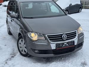 Grey Volkswagen Touran 2009 in Riga, with an engine capacity of 1.40 L and mileage of 168 thousand km for 4750 €, photo 8 on AUTOMOTO.COM.LV