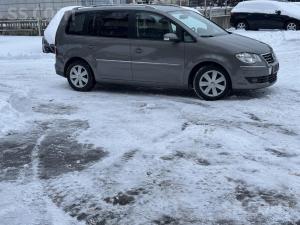 Grey Volkswagen Touran 2009 in Riga, with an engine capacity of 1.40 L and mileage of 168 thousand km for 4750 €, photo 18 on AUTOMOTO.COM.LV