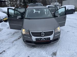 Grey Volkswagen Touran 2009 in Riga, with an engine capacity of 1.40 L and mileage of 168 thousand km for 4750 €, photo 19 on AUTOMOTO.COM.LV