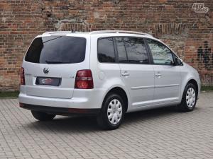 Pelēks Volkswagen Touran 2009 Viļņa, ar dzinēja tilpumu 1.40 L un nobraukumu 139 tūkst. km par 4100 €, foto 7 vietnē AUTOMOTO.COM.LV
