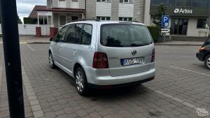 Grey Volkswagen Touran 2009 in Utena, with an engine capacity of 2.00 L and mileage of 300 thousand km for 1999 €, photo 5 on AUTOMOTO.COM.LV