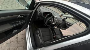 Grey Volkswagen Touran 2009 in Utena, with an engine capacity of 2.00 L and mileage of 300 thousand km for 1999 €, photo 9 on AUTOMOTO.COM.LV