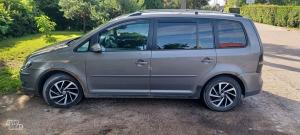 Grey Volkswagen Touran 2009 in Vilnius, with an engine capacity of 2.00 L and mileage of 322 thousand km for 1899 €, photo 5 on AUTOMOTO.COM.LV
