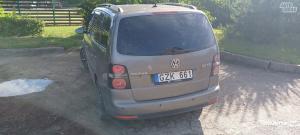 Grey Volkswagen Touran 2009 in Vilnius, with an engine capacity of 2.00 L and mileage of 322 thousand km for 1899 €, photo 6 on AUTOMOTO.COM.LV