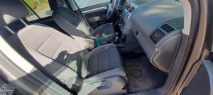 Grey Volkswagen Touran 2009 in Vilnius, with an engine capacity of 2.00 L and mileage of 322 thousand km for 1899 €, photo 13 on AUTOMOTO.COM.LV