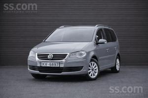 Pelēks Volkswagen Touran 2009 Rīga, ar dzinēja tilpumu 1.90 L un nobraukumu 280 tūkst. km par 4990 €, foto  vietnē AUTOMOTO.COM.LV