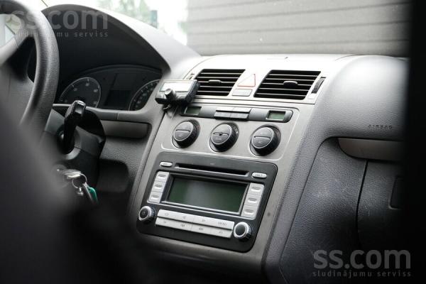 Pelēks Volkswagen Touran 2009 Rīga, ar dzinēja tilpumu 1.90 L un nobraukumu 280 tūkst. km par 4990 €, foto 7 vietnē AUTOMOTO.COM.LV