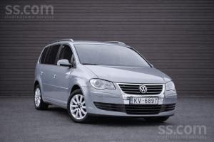 Pelēks Volkswagen Touran 2009 Rīga, ar dzinēja tilpumu 1.90 L un nobraukumu 280 tūkst. km par 4990 €, foto 3 vietnē AUTOMOTO.COM.LV
