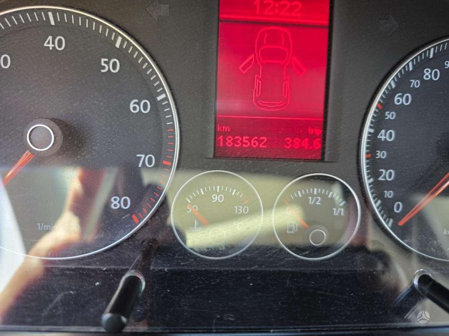Grey Volkswagen Touran 2009 in Kursenai, with an engine capacity of 1.39 L and mileage of 184 thousand km for 2500 €, photo 22 on AUTOMOTO.COM.LV