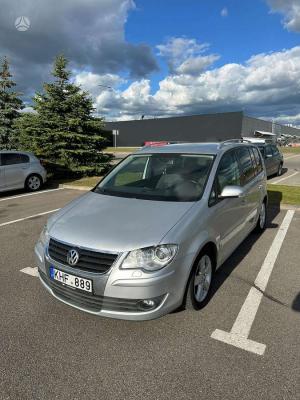 Grey Volkswagen Touran 2009 in Panevezys, with an engine capacity of 1.97 L and mileage of 334 thousand km for 3300 €, photo  on AUTOMOTO.COM.LV