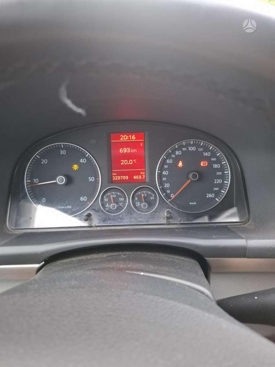 Grey Volkswagen Touran 2009 in Skuodas, with an engine capacity of 1.97 L and mileage of 320 thousand km for 2700 €, photo 11 on AUTOMOTO.COM.LV