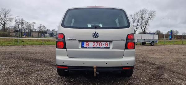Grey Volkswagen Touran 2009 in Daugavpils, with an engine capacity of 1.90 L and mileage of 265 thousand km for 4250 €, photo 4 on AUTOMOTO.COM.LV