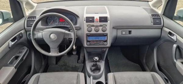 Grey Volkswagen Touran 2009 in Daugavpils, with an engine capacity of 1.90 L and mileage of 265 thousand km for 4250 €, photo 9 on AUTOMOTO.COM.LV