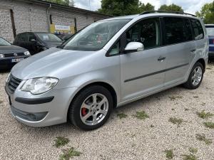 Grey Volkswagen Touran 2009 in Limbazi, with an engine capacity of 1.90 L and mileage of 255 thousand km for 4550 €, photo  on AUTOMOTO.COM.LV