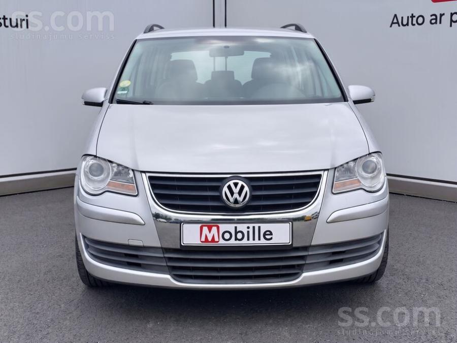 Pelēks Volkswagen Touran 2009 Rīga, ar dzinēja tilpumu 1.60 L un nobraukumu 195 tūkst. km par 4950 €, foto 3 vietnē AUTOMOTO.COM.LV