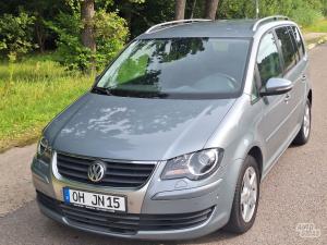 Grey Volkswagen Touran 2009 in Mazeikiai, with an engine capacity of 1.90 L and mileage of 289 thousand km for 4150 €, photo  on AUTOMOTO.COM.LV