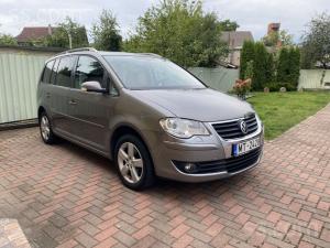 Grey Volkswagen Touran 2009 in Daugavpils, with an engine capacity of 1.90 L and mileage of 293 thousand km for 3850 €, photo  on AUTOMOTO.COM.LV