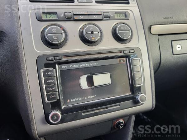 Grey Volkswagen Touran 2009 in Tukums, with an engine capacity of 2.00 L and mileage of 394 thousand km for 2490 €, photo 11 on AUTOMOTO.COM.LV