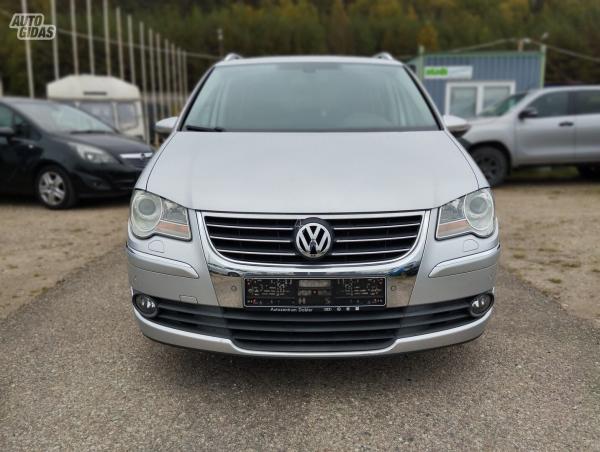 Grey Volkswagen Touran 2009 in Vilnius, with an engine capacity of 1.40 L and mileage of 253 thousand km for 4250 €, photo 3 on AUTOMOTO.COM.LV