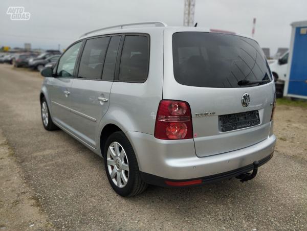 Grey Volkswagen Touran 2009 in Vilnius, with an engine capacity of 1.40 L and mileage of 253 thousand km for 4250 €, photo 6 on AUTOMOTO.COM.LV