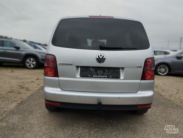 Grey Volkswagen Touran 2009 in Vilnius, with an engine capacity of 1.40 L and mileage of 253 thousand km for 4250 €, photo 7 on AUTOMOTO.COM.LV