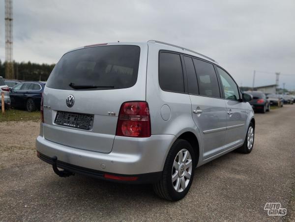 Grey Volkswagen Touran 2009 in Vilnius, with an engine capacity of 1.40 L and mileage of 253 thousand km for 4250 €, photo 8 on AUTOMOTO.COM.LV