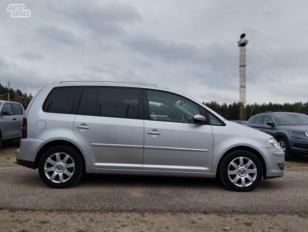 Grey Volkswagen Touran 2009 in Vilnius, with an engine capacity of 1.40 L and mileage of 253 thousand km for 4250 €, photo 9 on AUTOMOTO.COM.LV