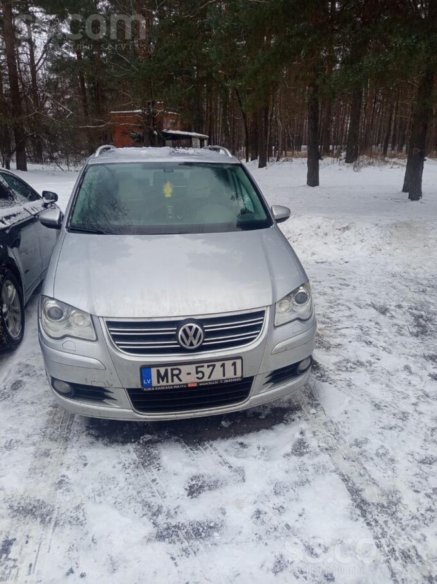 Grey Volkswagen Touran 2010 in Riga, with an engine capacity of 2.00 L and mileage of 341 thousand km for 3000 €, photo 2 on AUTOMOTO.COM.LV