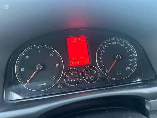 Grey Volkswagen Touran 2010 in Jurbarkas, with an engine capacity of 1.97 L and mileage of 241 thousand km for 3899 €, photo 5 on AUTOMOTO.COM.LV