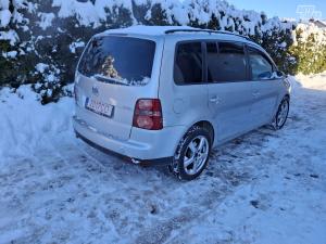 Grey Volkswagen Touran 2010 in Mazeikiai, with an engine capacity of 2.00 L and mileage of 185 thousand km for 3700 €, photo 2 on AUTOMOTO.COM.LV