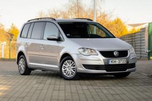 Grey Volkswagen Touran 2010 in Riga, with an engine capacity of 2.00 L and mileage of 232 thousand km for 3600 €, photo 3 on AUTOMOTO.COM.LV