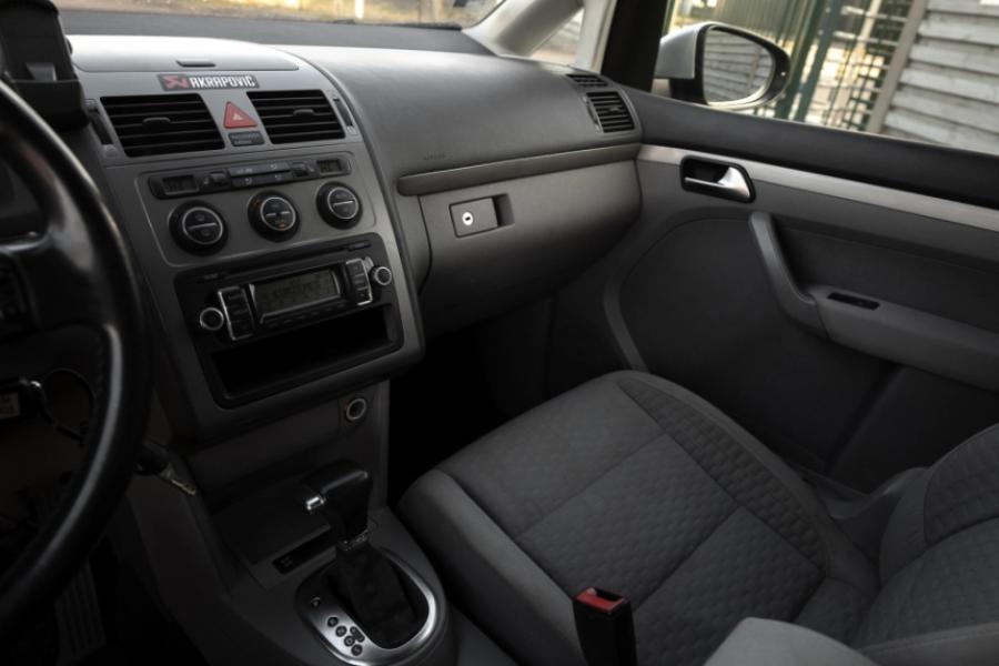 Grey Volkswagen Touran 2010 in Riga, with an engine capacity of 2.00 L and mileage of 232 thousand km for 3600 €, photo 12 on AUTOMOTO.COM.LV