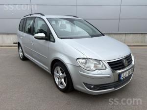 Grey Volkswagen Touran 2010 in Riga, with an engine capacity of 1.90 L and mileage of 281 thousand km for 1450 €, photo  on AUTOMOTO.COM.LV