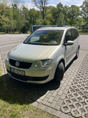 Grey Volkswagen Touran 2010 in Ventspils, with an engine capacity of 1.40 L and mileage of 251 thousand km for 4100 €, photo  on AUTOMOTO.COM.LV