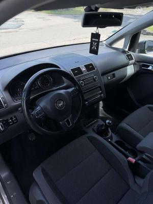 Grey Volkswagen Touran 2010 in Kaunas, with an engine capacity of 1.60 L and mileage of 198 thousand km for 6250 €, photo 8 on AUTOMOTO.COM.LV