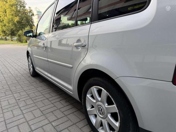 Grey Volkswagen Touran 2010 in Vilnius, with an engine capacity of 2.00 L and mileage of 289 thousand km for 3500 €, photo 10 on AUTOMOTO.COM.LV