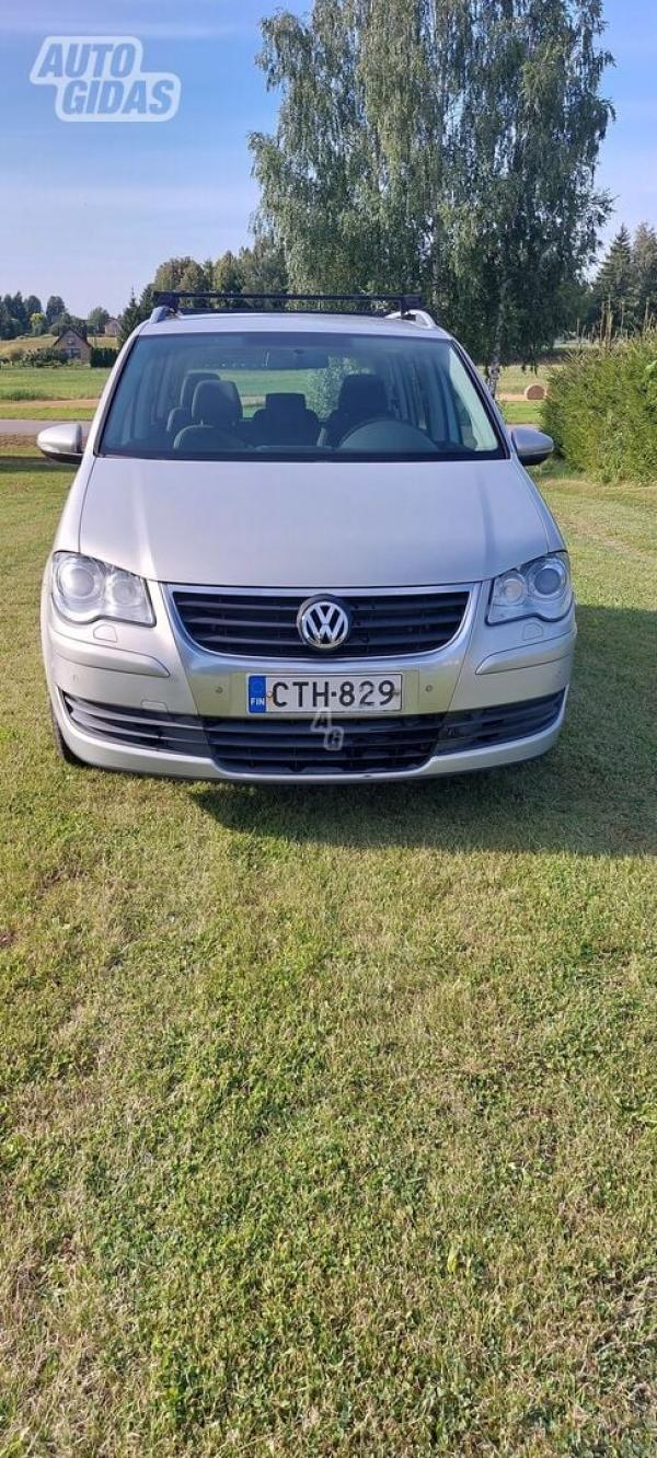Grey Volkswagen Touran 2010 in Kazlu Ruda, with an engine capacity of 1.40 L and mileage of 240 thousand km for 1800 €, photo 1 on AUTOMOTO.COM.LV