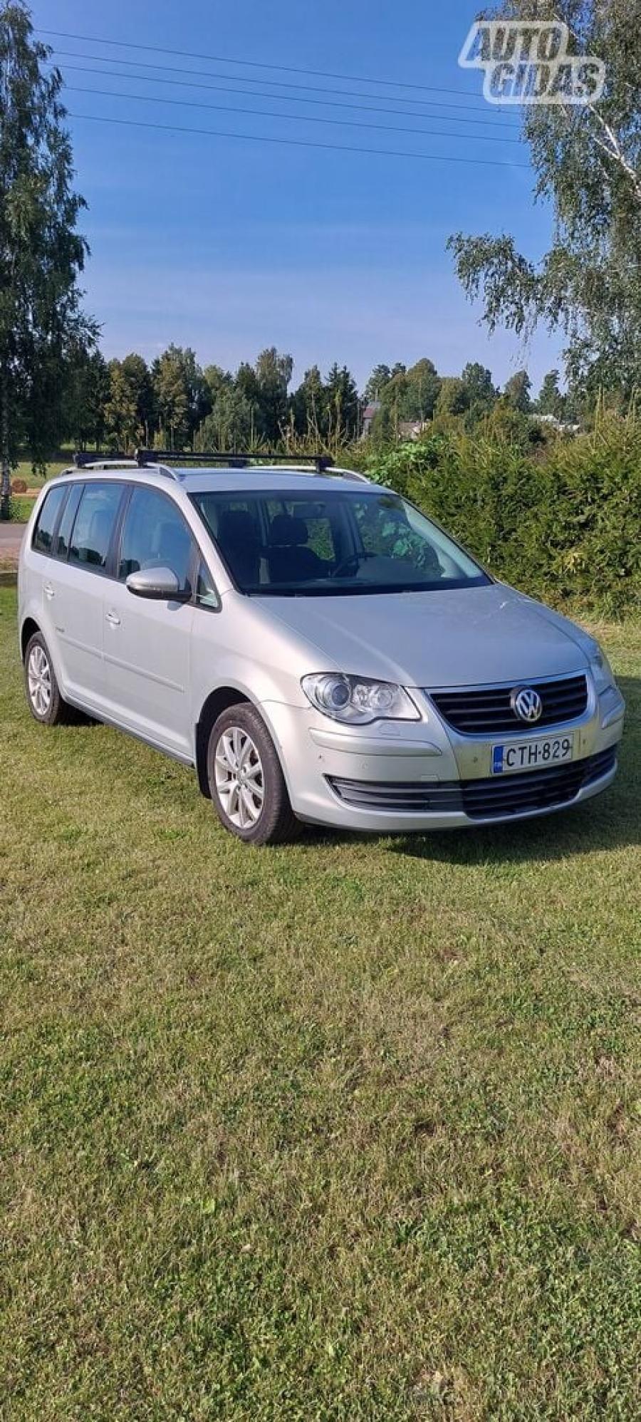 Grey Volkswagen Touran 2010 in Kazlu Ruda, with an engine capacity of 1.40 L and mileage of 240 thousand km for 1800 €, photo 3 on AUTOMOTO.COM.LV