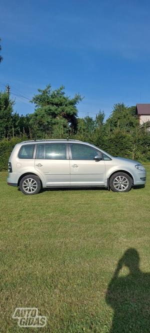 Grey Volkswagen Touran 2010 in Kazlu Ruda, with an engine capacity of 1.40 L and mileage of 240 thousand km for 1800 €, photo 4 on AUTOMOTO.COM.LV