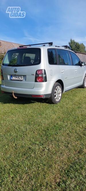 Grey Volkswagen Touran 2010 in Kazlu Ruda, with an engine capacity of 1.40 L and mileage of 240 thousand km for 1800 €, photo 5 on AUTOMOTO.COM.LV