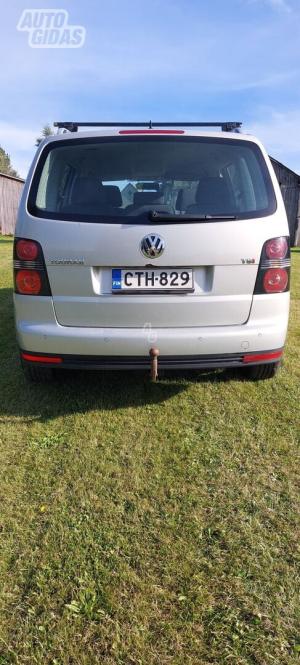 Grey Volkswagen Touran 2010 in Kazlu Ruda, with an engine capacity of 1.40 L and mileage of 240 thousand km for 1800 €, photo 6 on AUTOMOTO.COM.LV