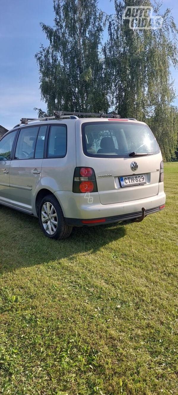 Grey Volkswagen Touran 2010 in Kazlu Ruda, with an engine capacity of 1.40 L and mileage of 240 thousand km for 1800 €, photo 6 on AUTOMOTO.COM.LV